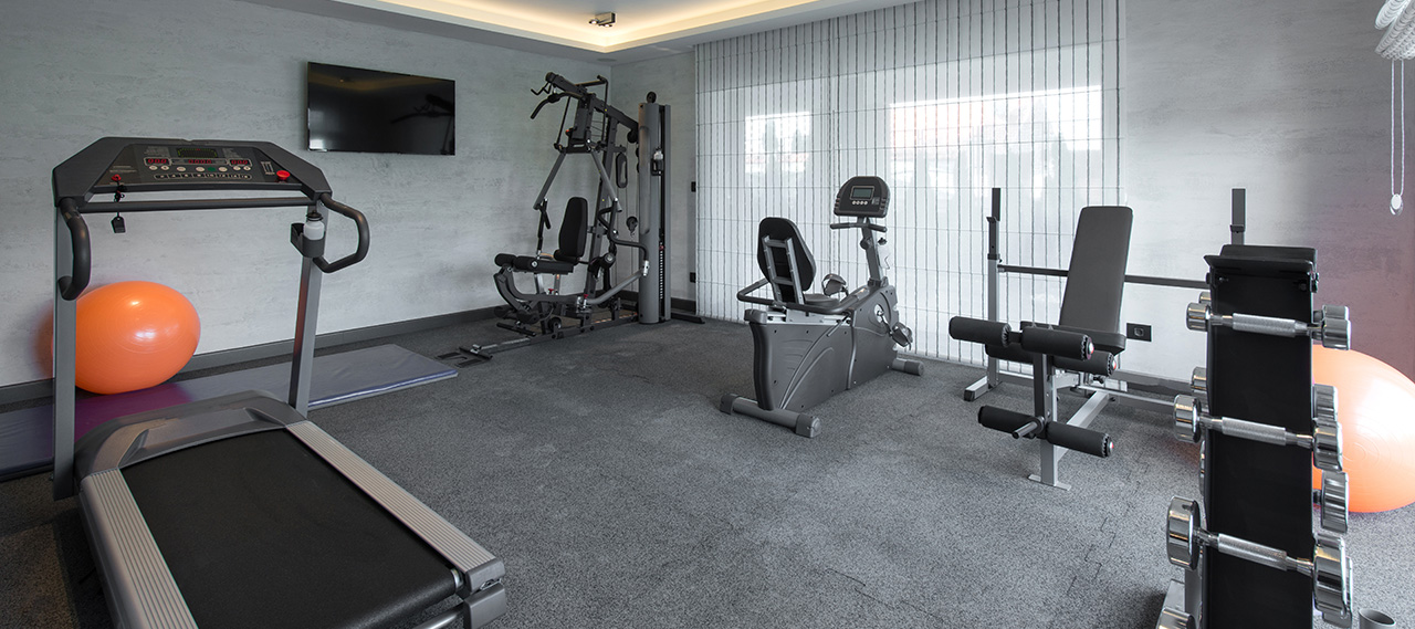 Home gym in luxury villa house - Califitness